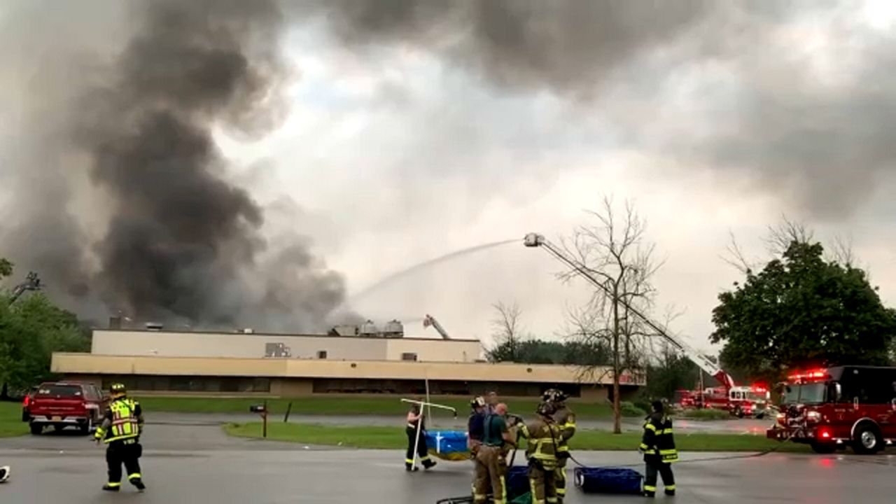 Fire at Amherst industrial park shuts down part of thruway
