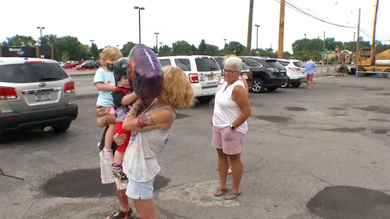 Family of children who survived a car crash come together for a balloon ...