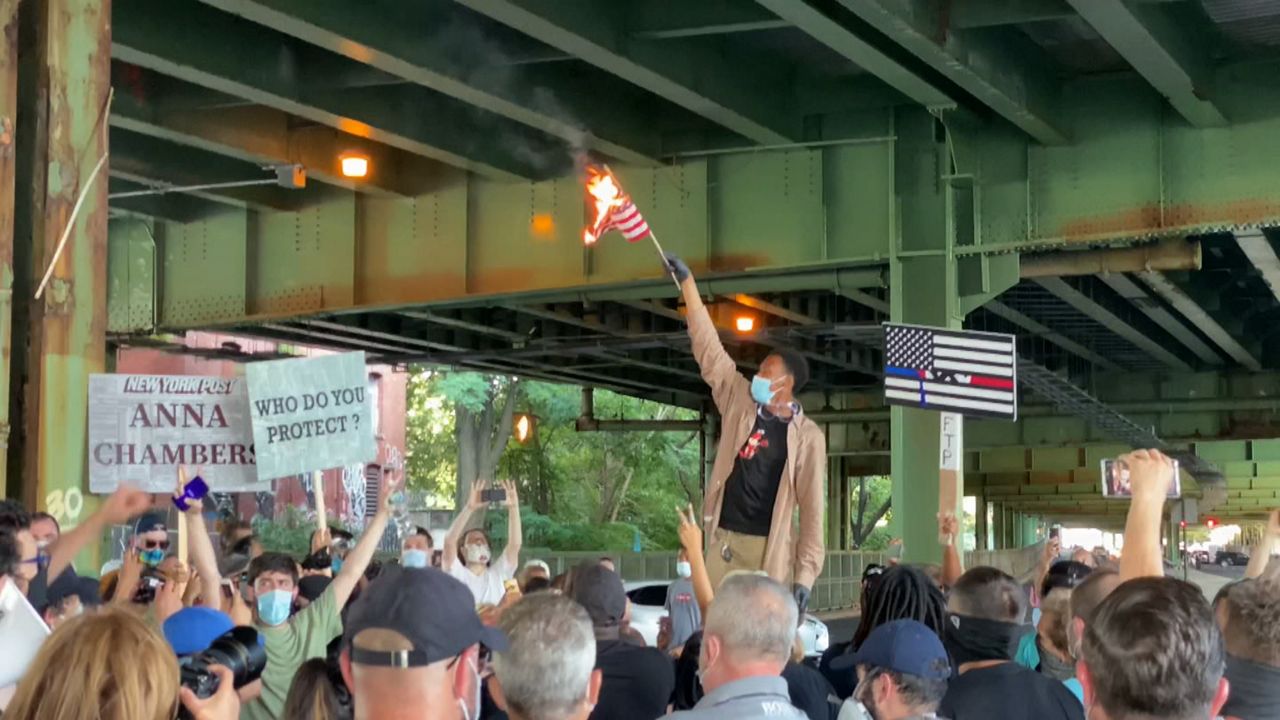 Pro-Police Protesters Face Off with Black Lives Matter Protesters
