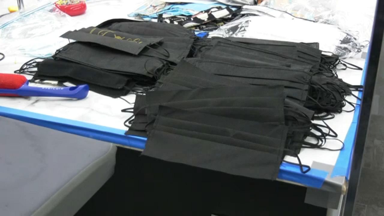 Tom & Luigi's Tailor Shop Making Tailor-Made Masks