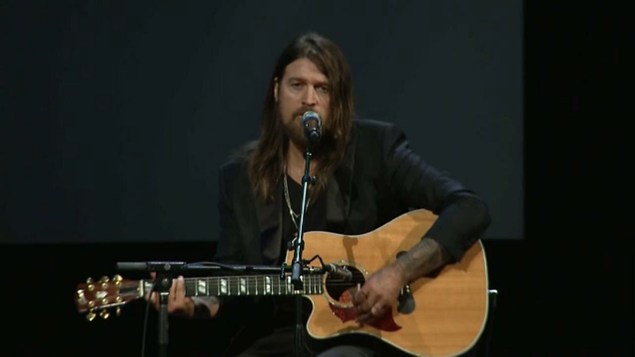 Billy Ray Cyrus Performs at Funeral for Slain Sgt. Ron Helus