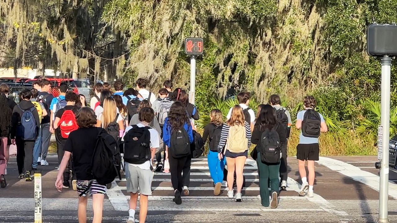 Parents push for crossing guards at high schools