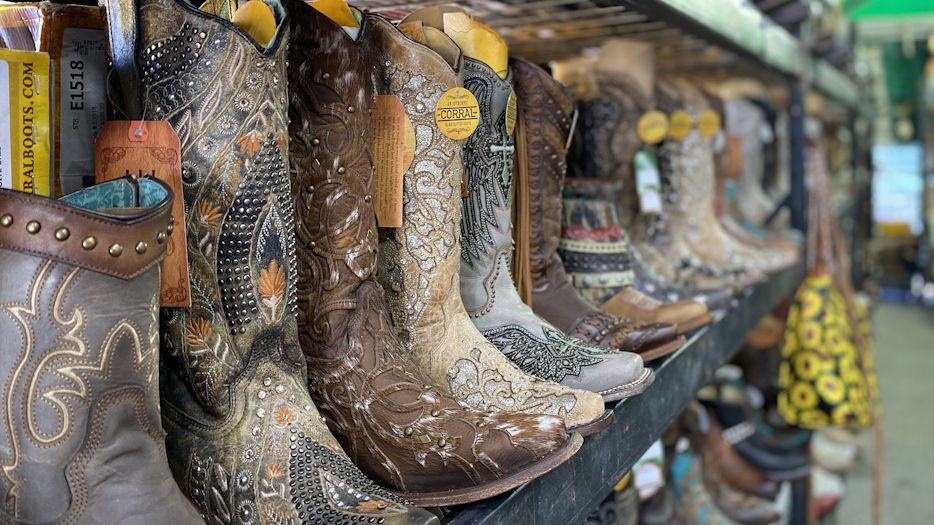 Leather vendor soaks up last Saturday at the State Fair