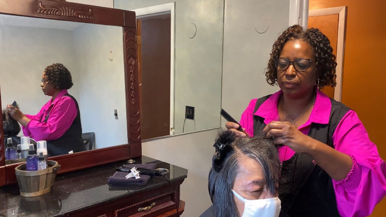 Survivor helping others find strength through hair