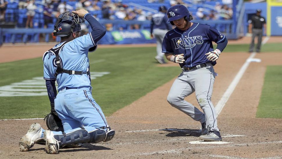 Rays rally with 5 walks in 9th, top Jays for 10th win in row