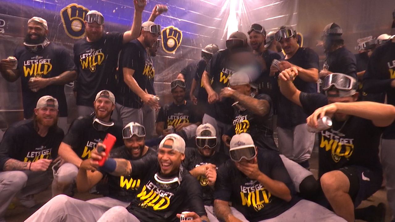 Brewers clinch postseason birth with win over Reds