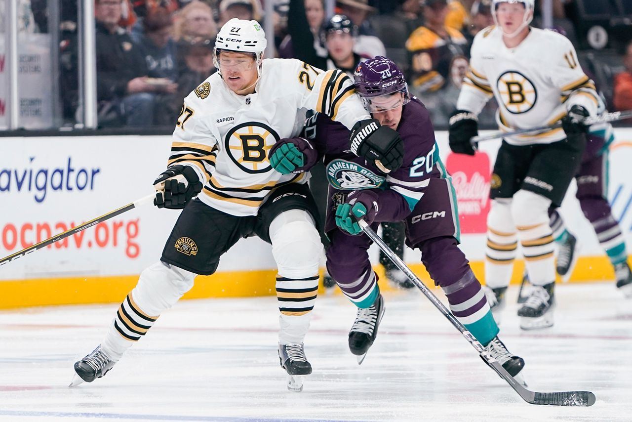 Bruins rally past Ducks, extend season-opening win streak