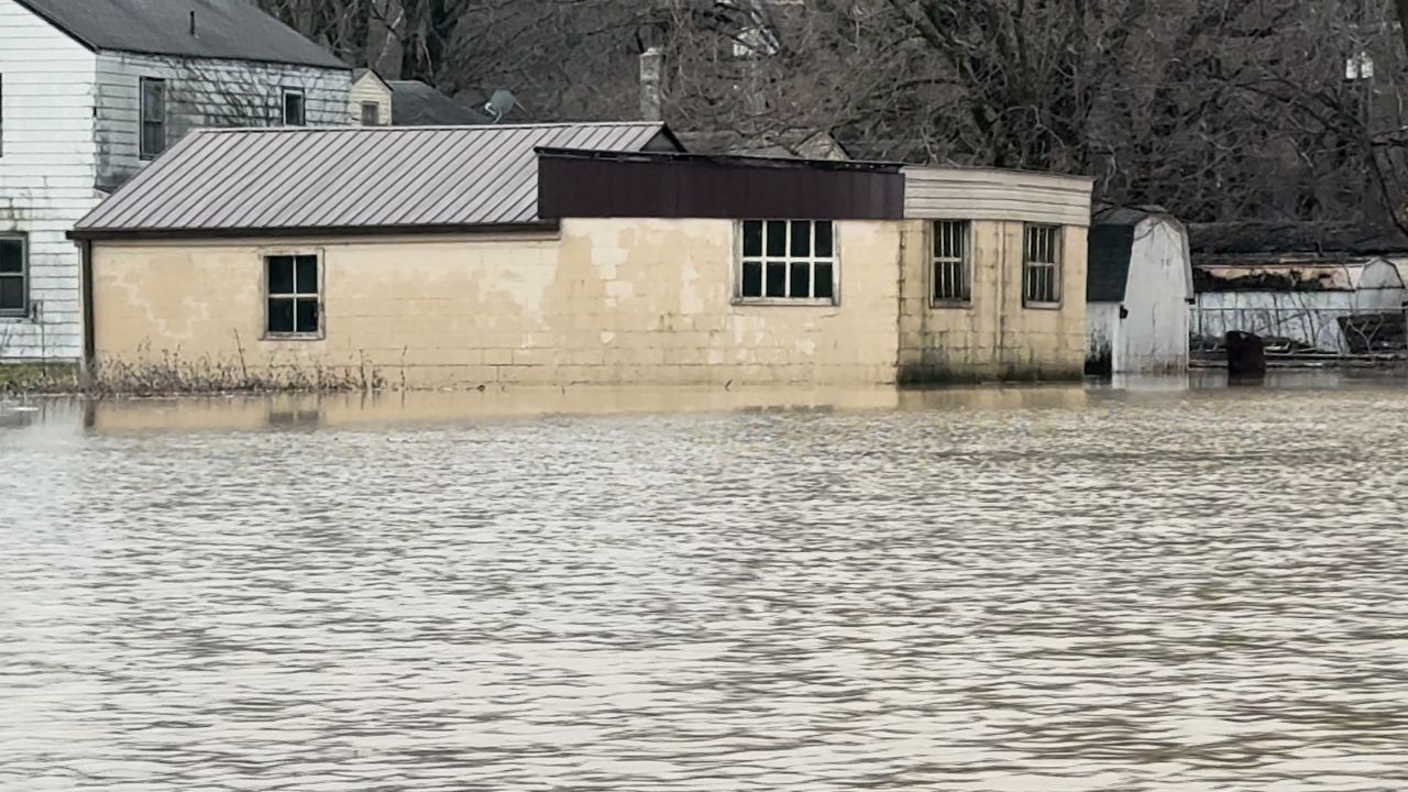 Flash flooding leaves crews, residents battling damage