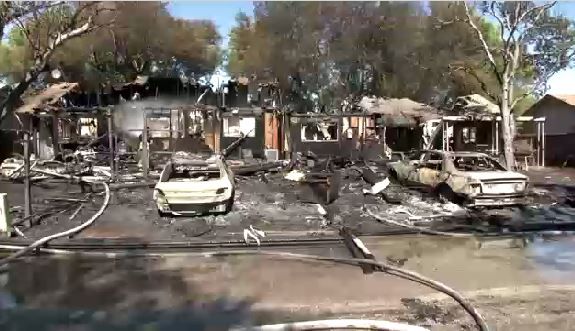 Car Fire Leads to Destruction of Two Homes