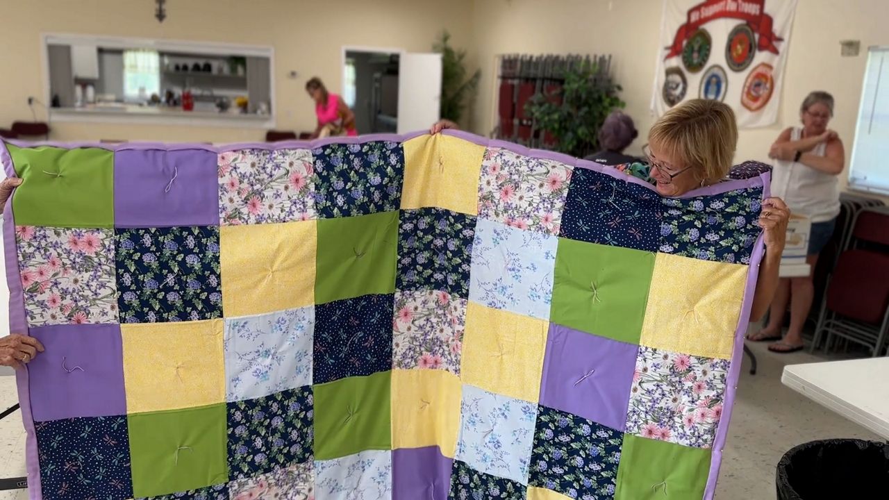 90-year-old Carol Bussian leads church quilting group