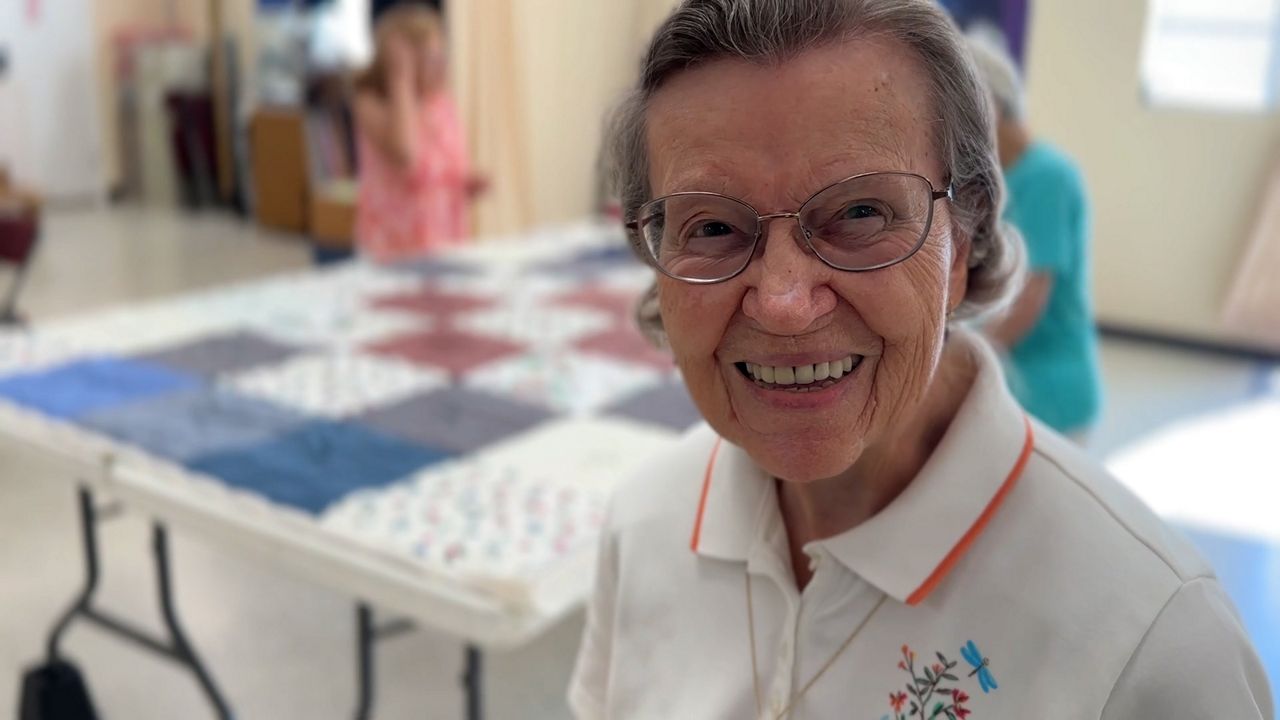 90-year-old Carol Bussian leads church quilting group