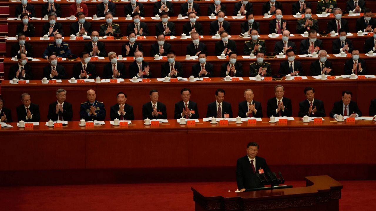 China's Xi calls for military growth as party congress opens