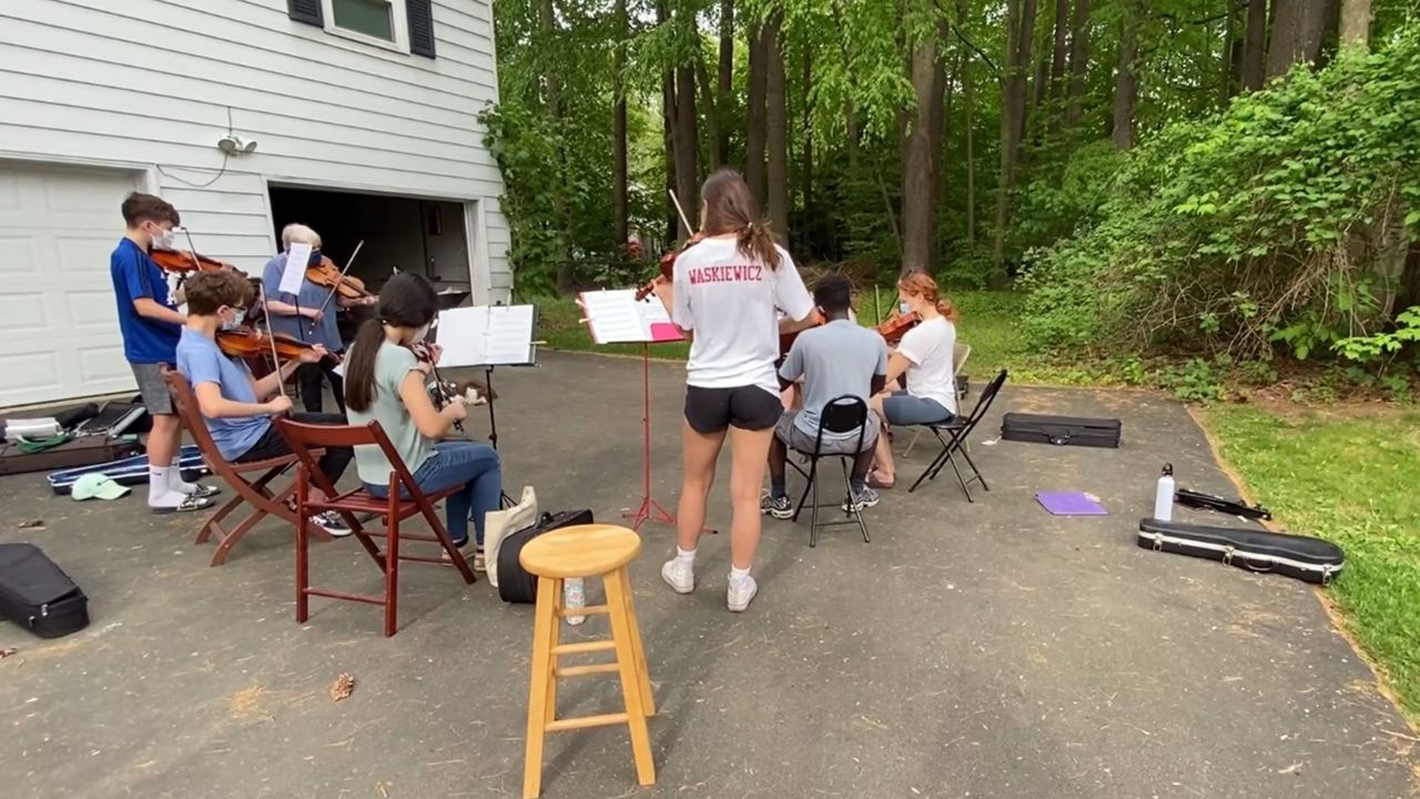Outdoor music lessons continue to help students shine