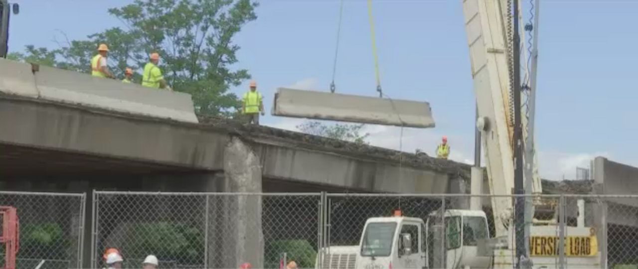 Crews continue cleaning after bridge sidewall collapse