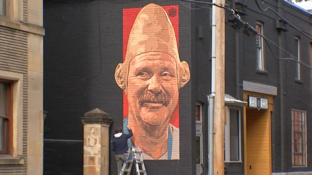 Beer vendor 'Conehead' immortalized on mural in Rochester
