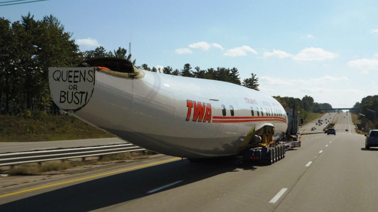 Restored TWA Plane Makes its Way to New JFK Hotel