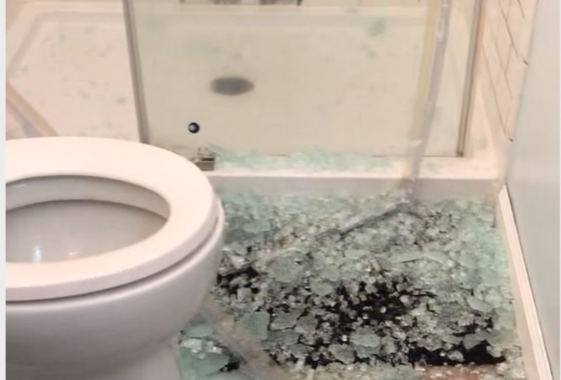 Homeowners' glass shower door spontaneously shatters