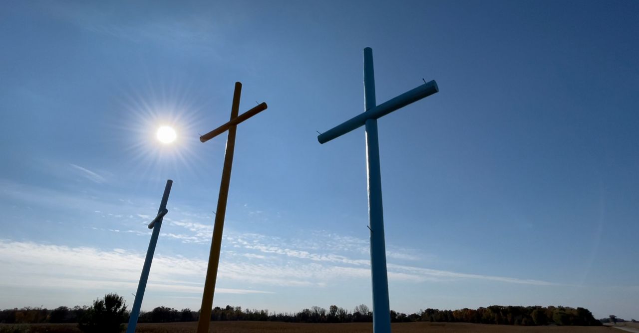 Bucyrus Couple restoring crosses to original glory