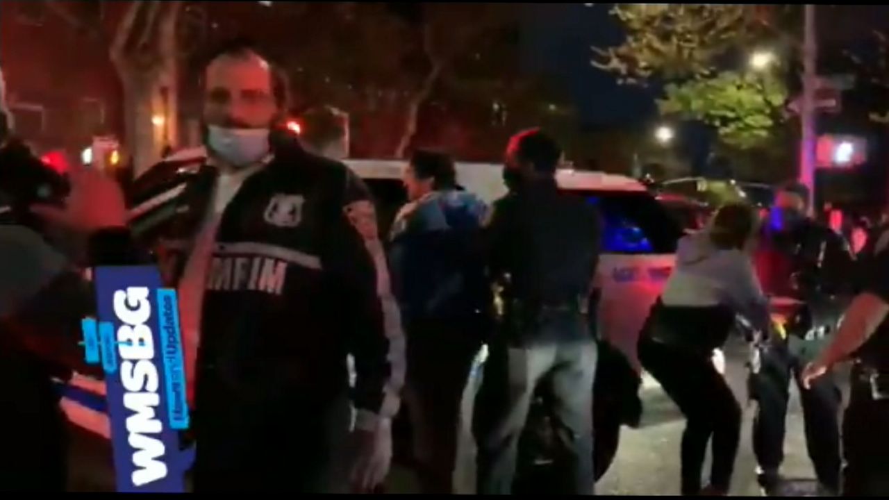 Couple Charged with Hate Crime After Ripping Masks Off