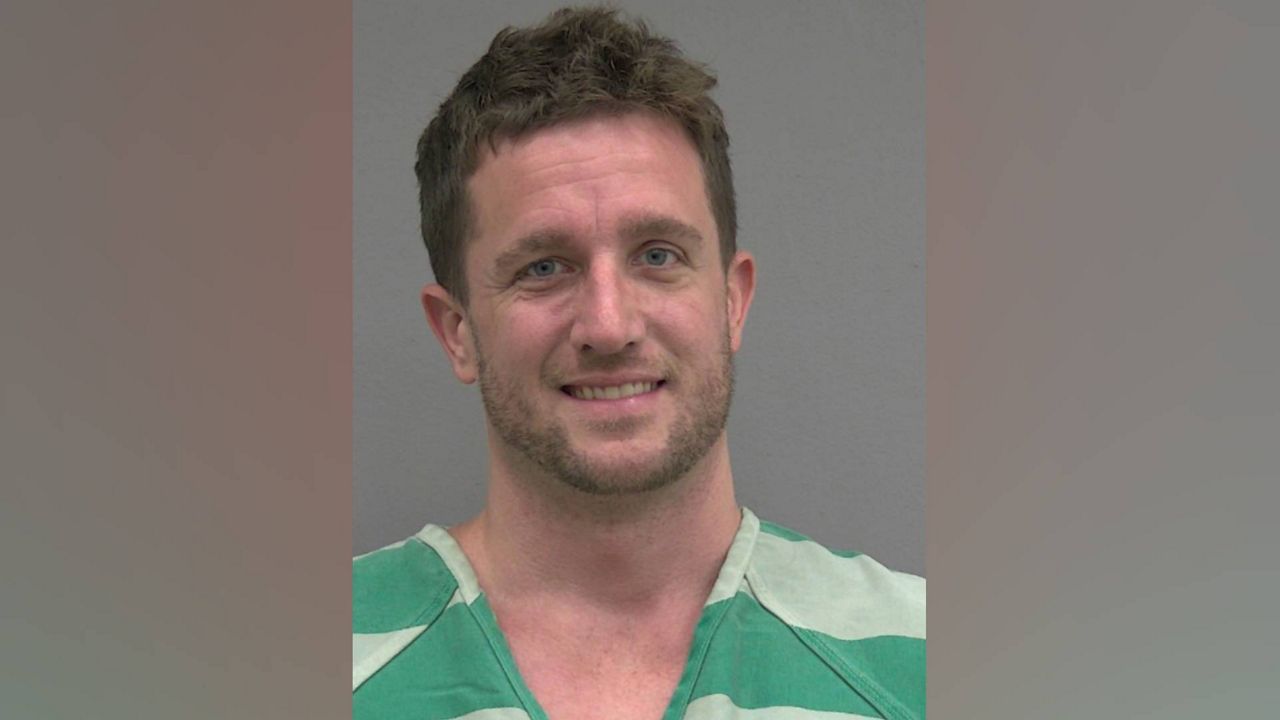 Second arrest in hanging of antisemitic banners along I-4