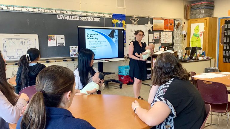 David Prouty teacher educating students at former highschool