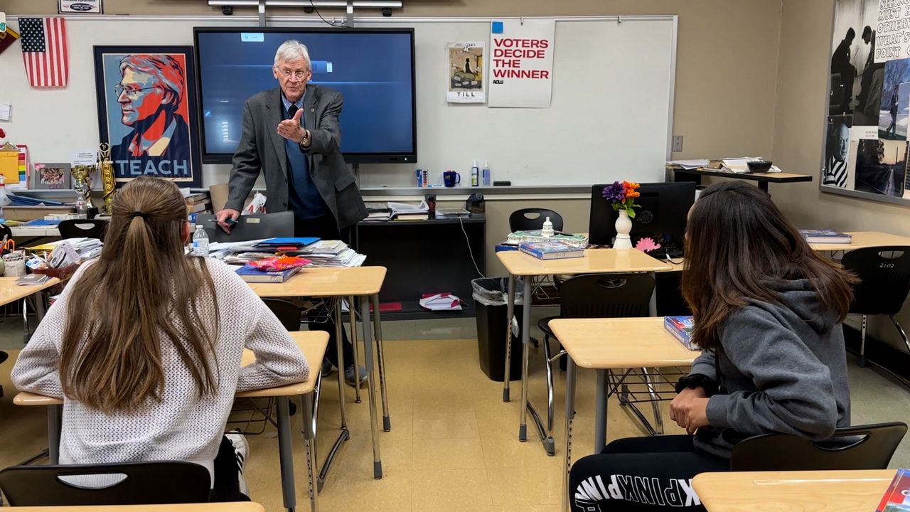 51-year teaching veteran writes book,