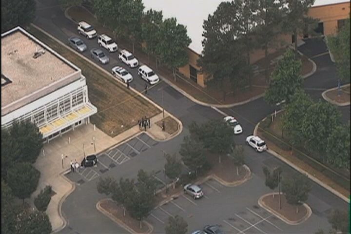 Newspaper Carrier Shot, Killed by Grandson; Found Outside Durham Red Cross