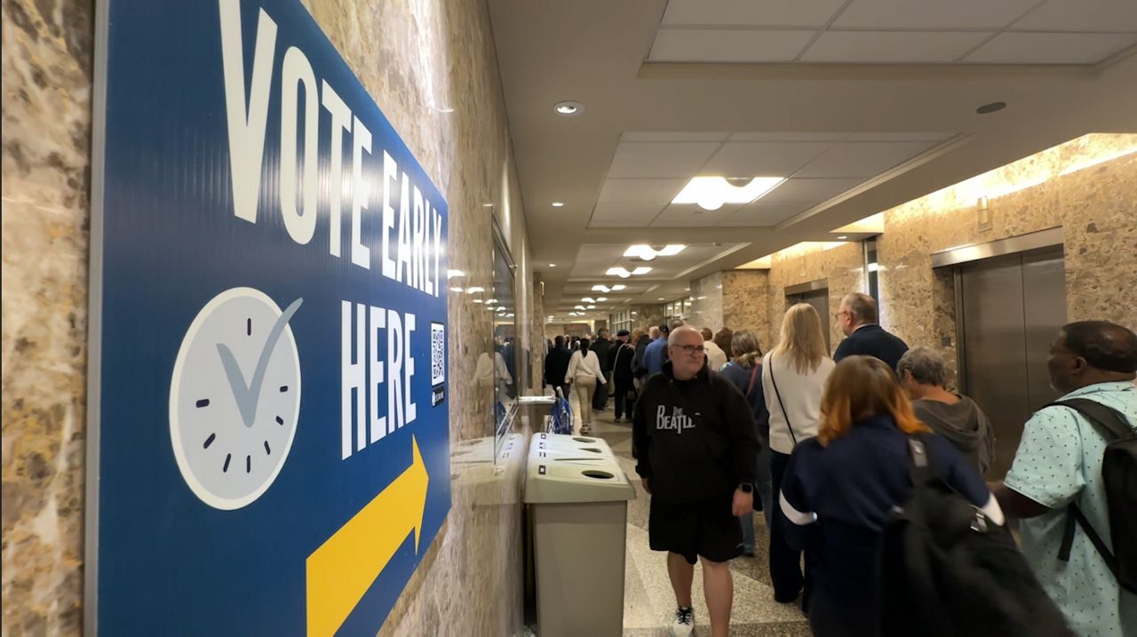 Early voting begins with long lines in downtown Milwaukee