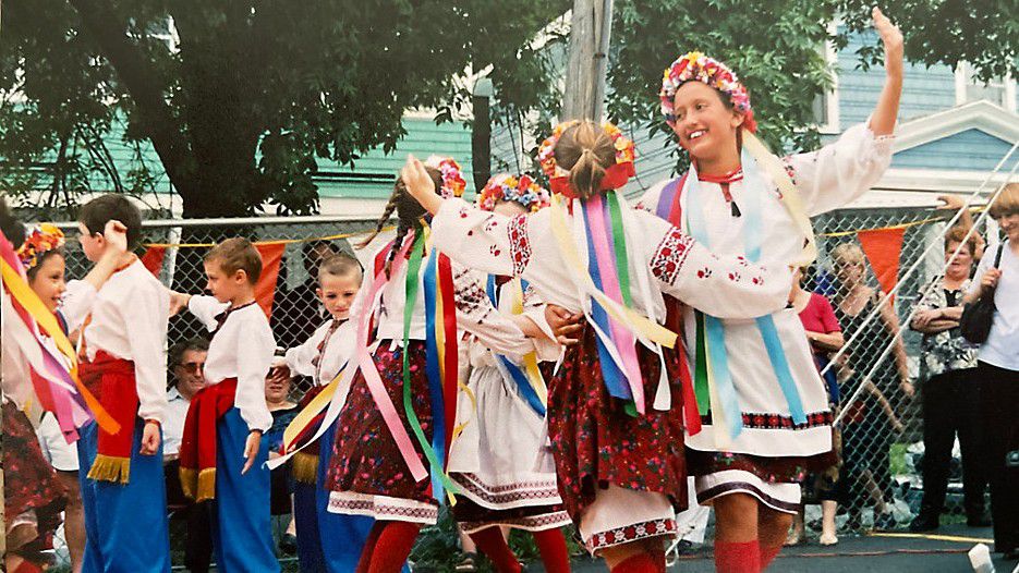 Triangle woman forms Ukrainian dance group