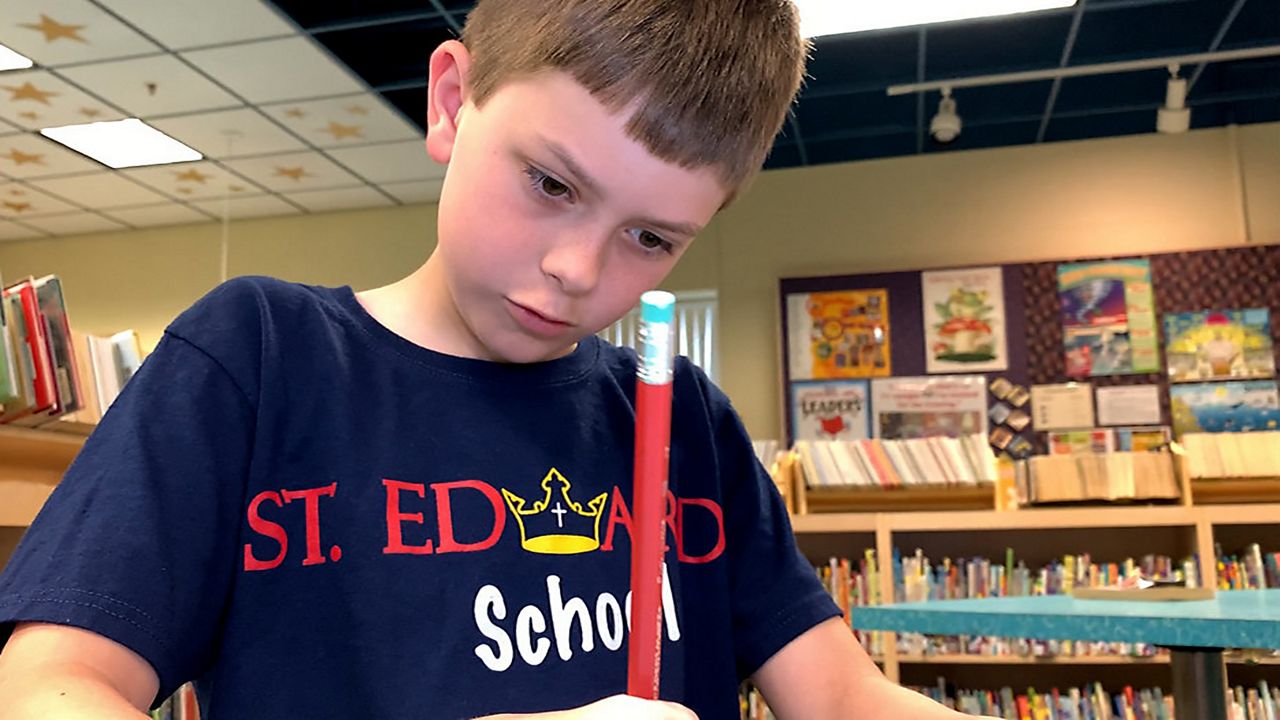 Ashland 5th grader honored for excellent penmanship