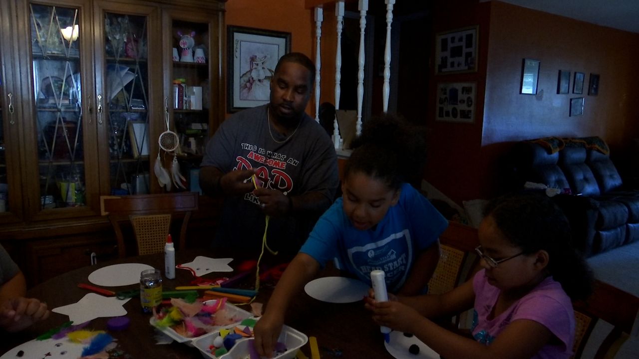 Hamilton Co. Fatherhood Project helps dads grow