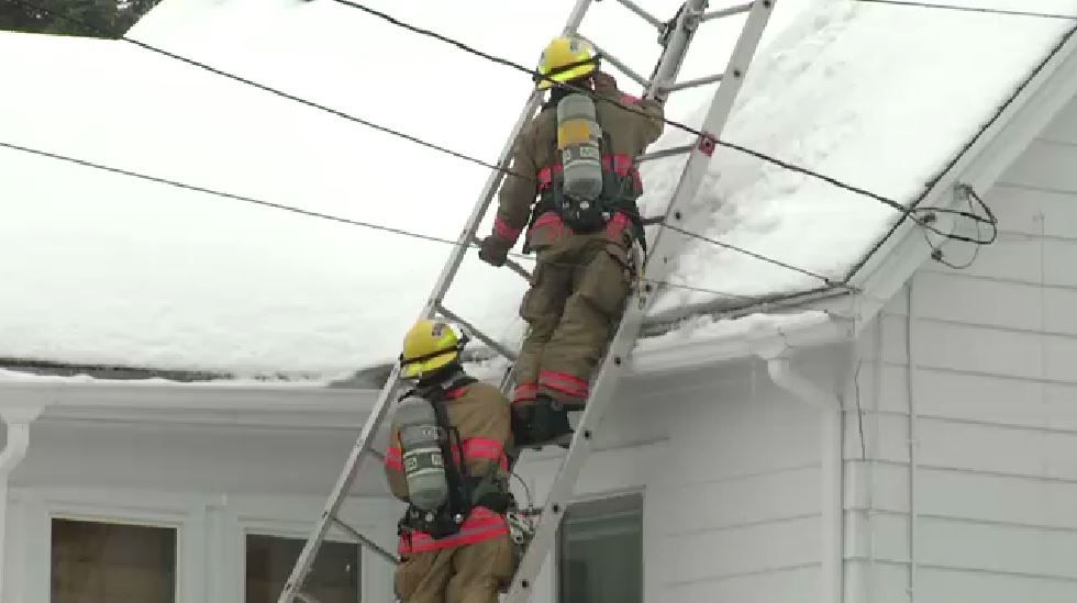 Low temps, falling snow create difficult fire fighting conditions