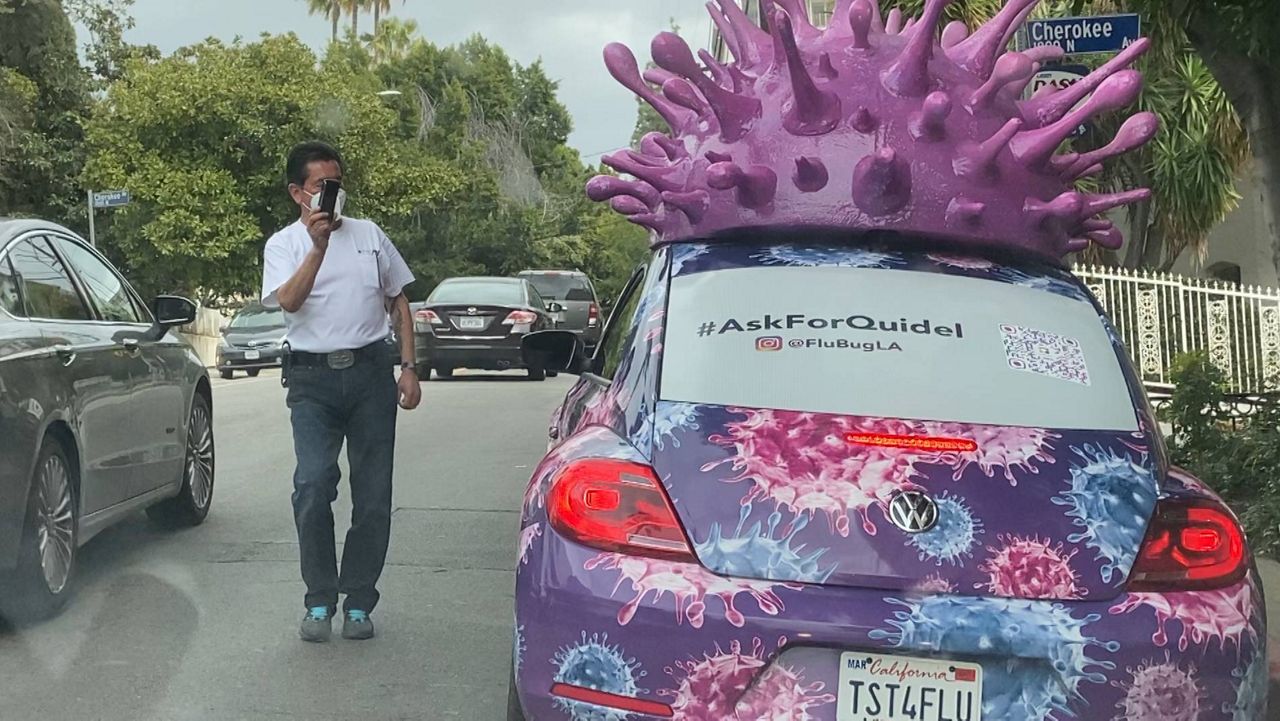 Flu Bug Turns Heads as Part of Flu and COVID-19 Prevention Campaign