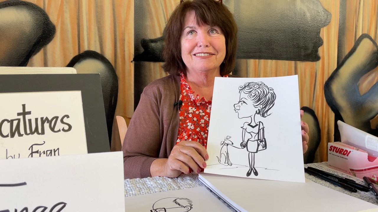 Lexington cartoon artist shows talents at local market