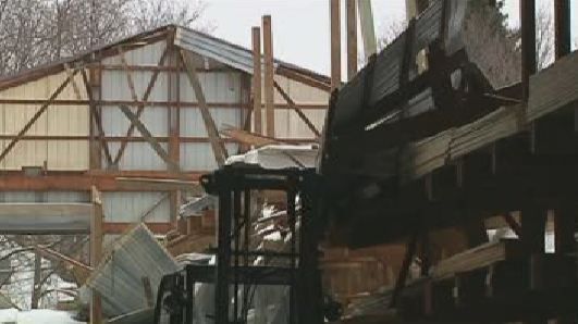 Heavy Snow Causes Warehouse Roof Collapse