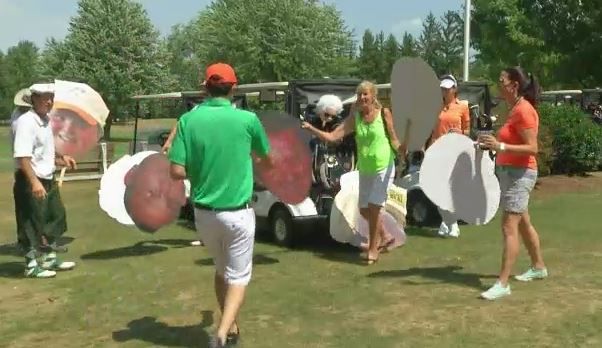 Helicopter Drops Golf Balls on Course for Charity