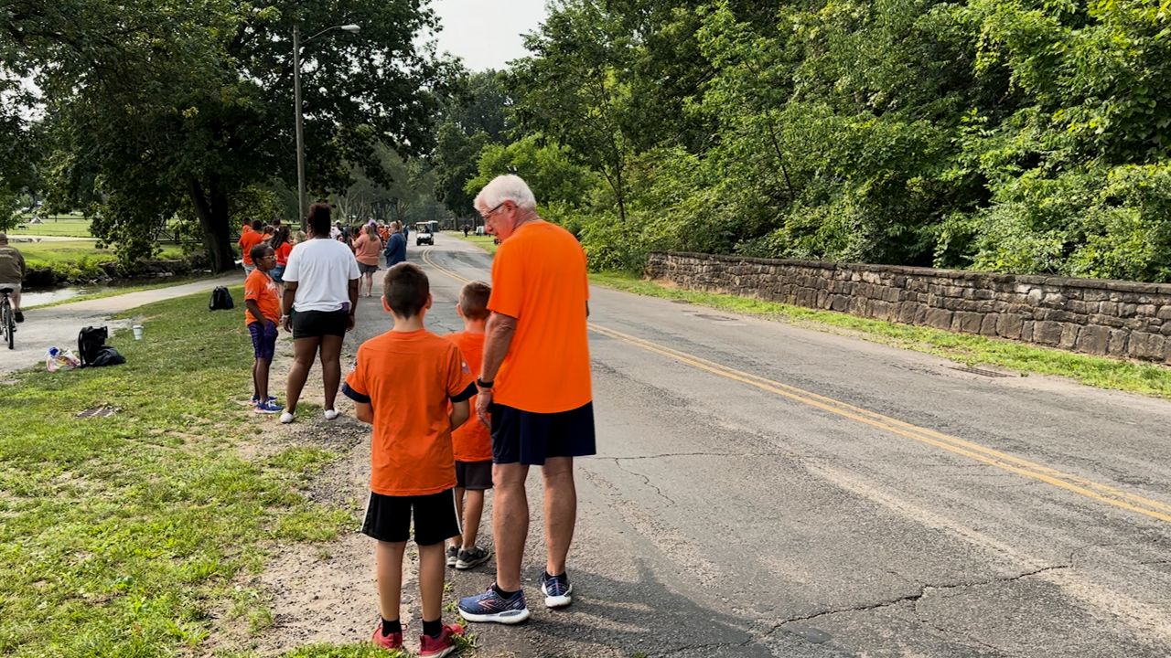 Canton children create human chain for 'Play Football'