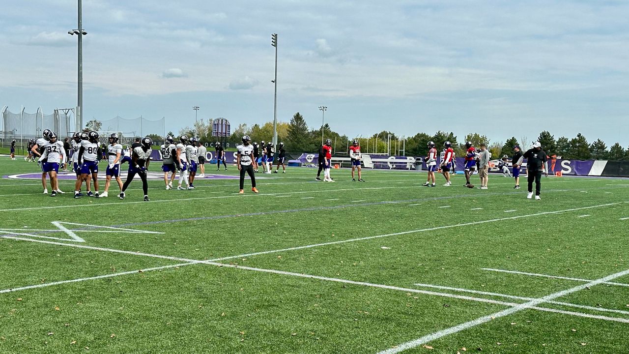 Holy Cross football players feel like pros during fall break