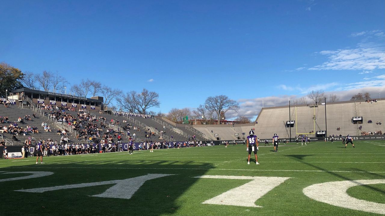 Holy Cross Football Logo Illustration of a Wooden Christian Cross ...