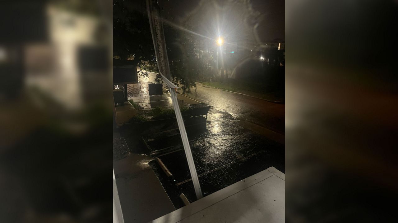 Spectrum News Trevor Pettiford surveys flooding in Gulfport