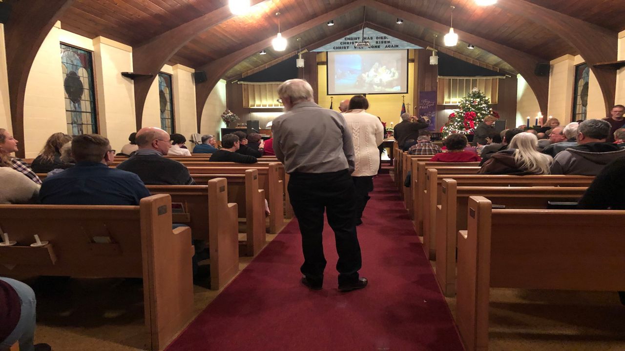 Crowds Gather for Christmas Eve Services