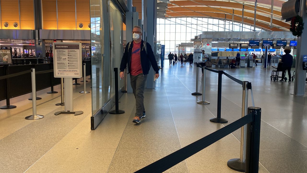 Holiday travelers navigate busy day at RDU