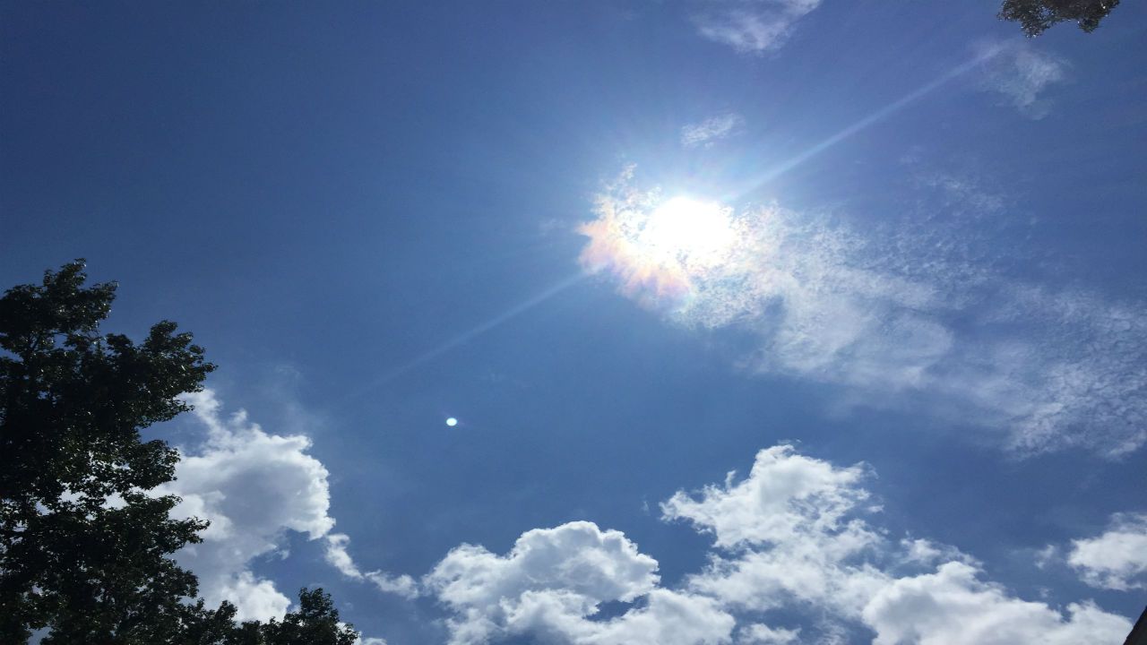 Mostly Sunny and Seasonably Hot on Tuesday