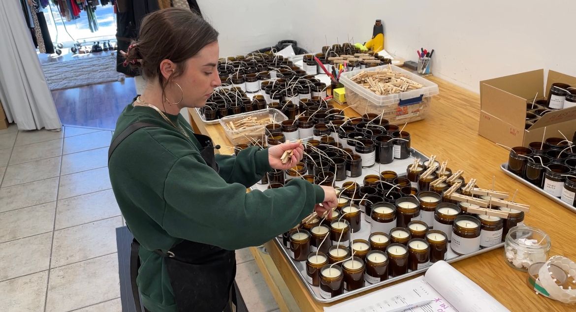 Local candle company makes adjustments in its wax