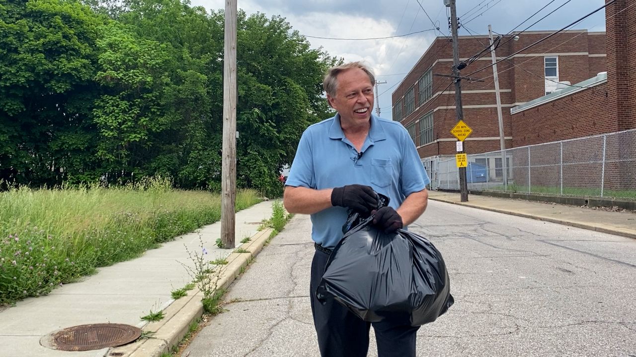 ‘Best-dressed trash man around’: church volunteer puts litter in its place