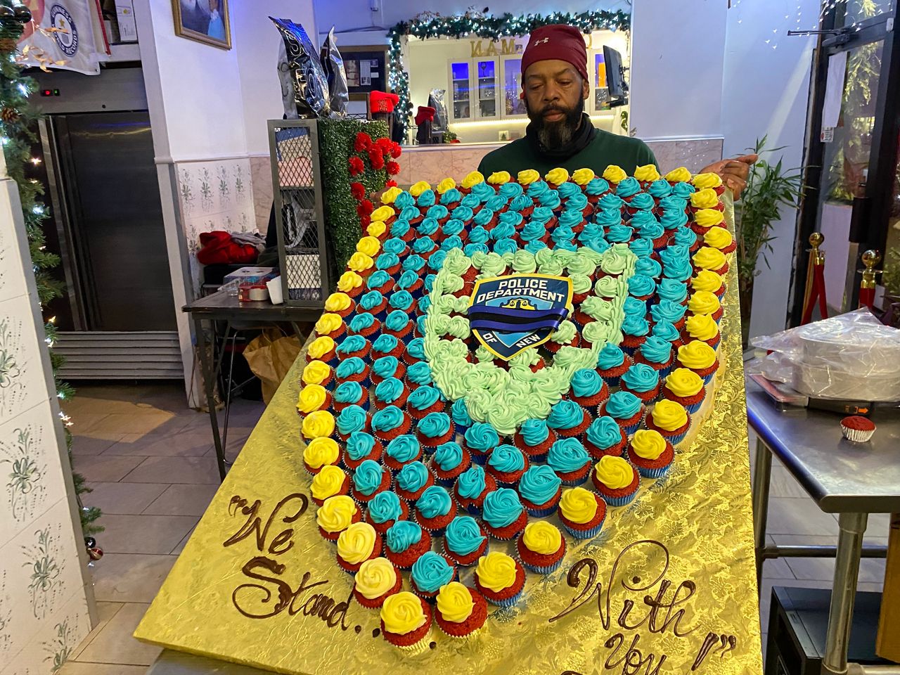 Harlem community shows support for devastated NYPD