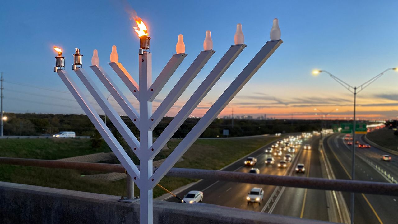 Hanukkah, antisemitism, mopac bridge, Austin, menorah