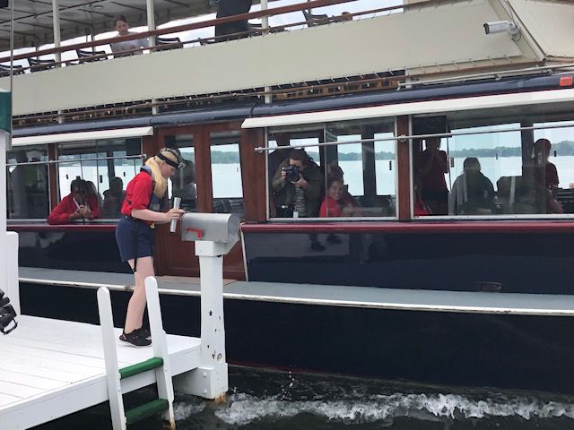 Jumpers Make a Splash in Lake Geneva Mail Boat Tryouts