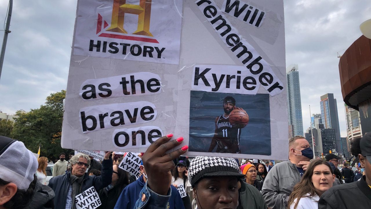 Kyrie Irving fans protest city's vaccine mandate