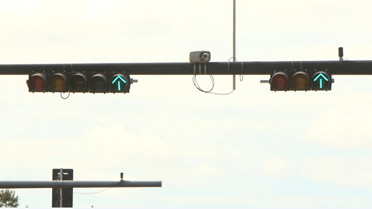 Left turn on green straight arrow allowed on Goldenrod Road